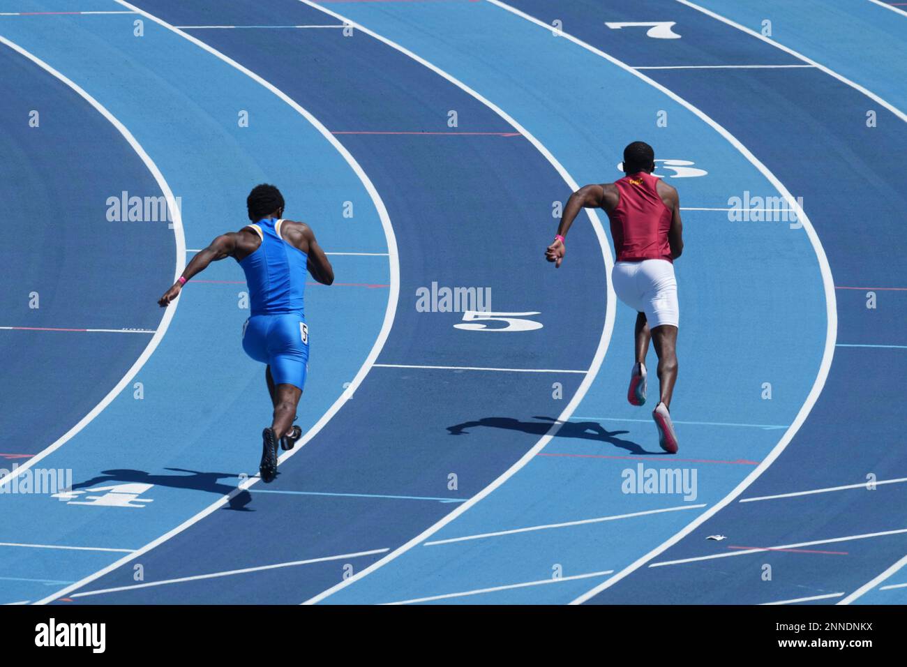Davonte Burnett of UCLA (left) and Nicholas Ramey of Southern ...