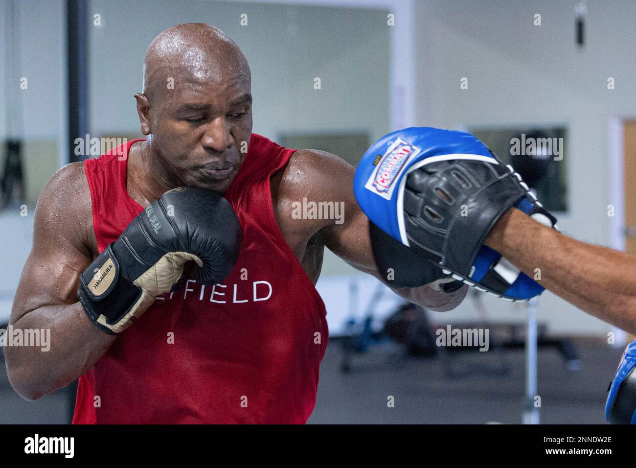 Former heavyweight boxing champion Evander Holyfield trains for an ...