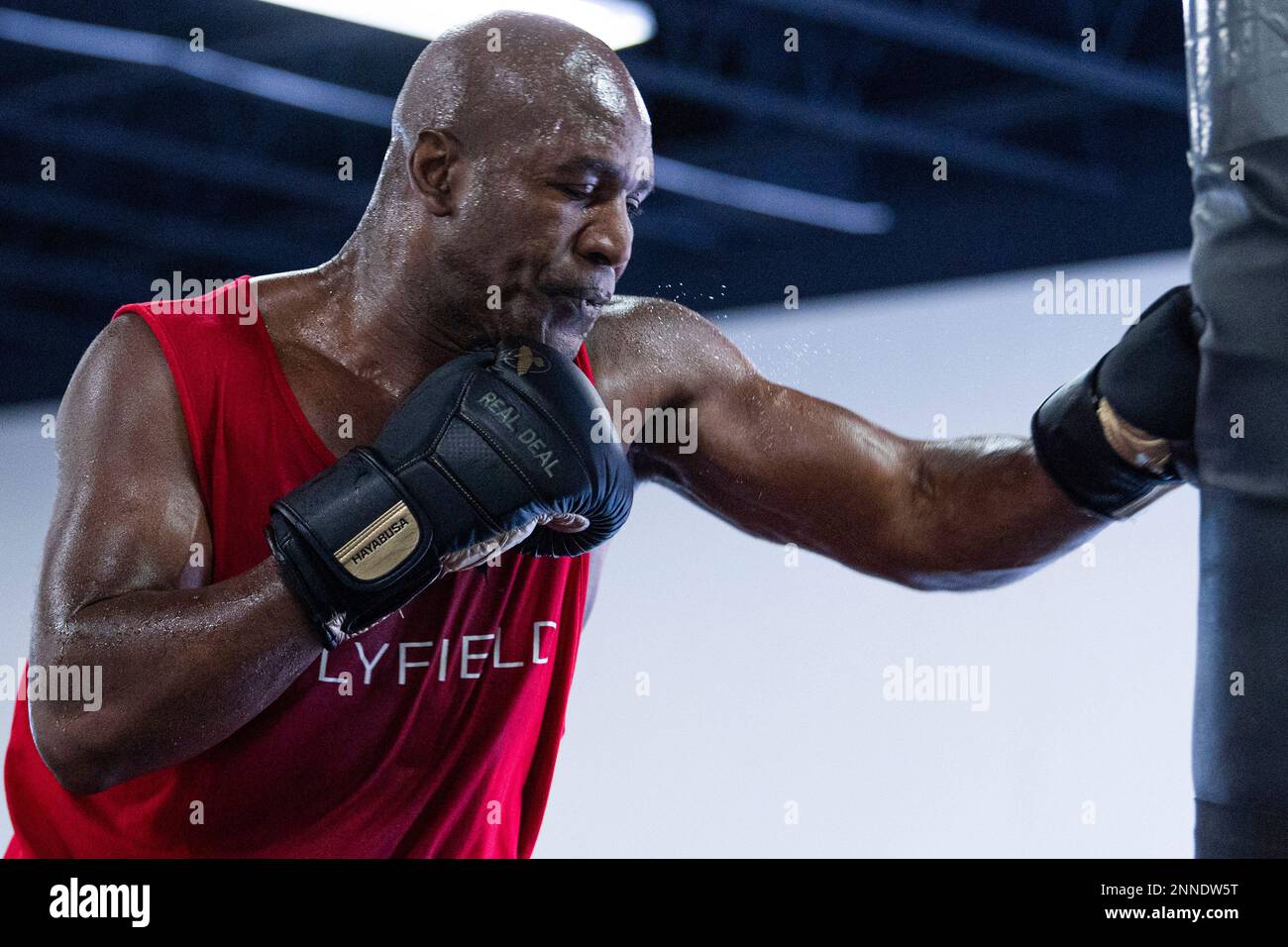 Former heavyweight boxing champion Evander Holyfield trains for an ...
