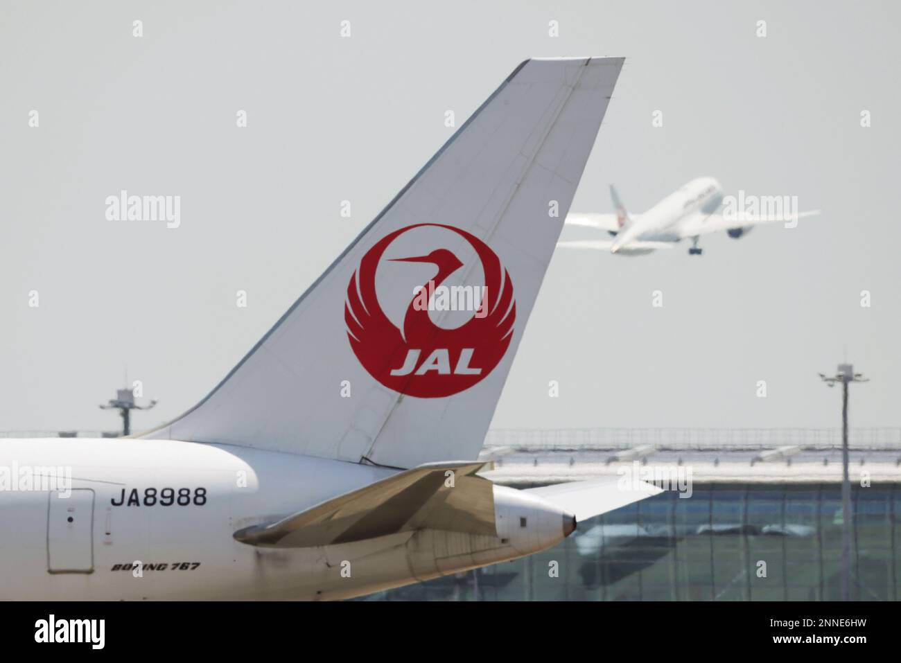 A photo shows Japan Airlines (JAL / Nikko / Nikkō) logo mark on the ...