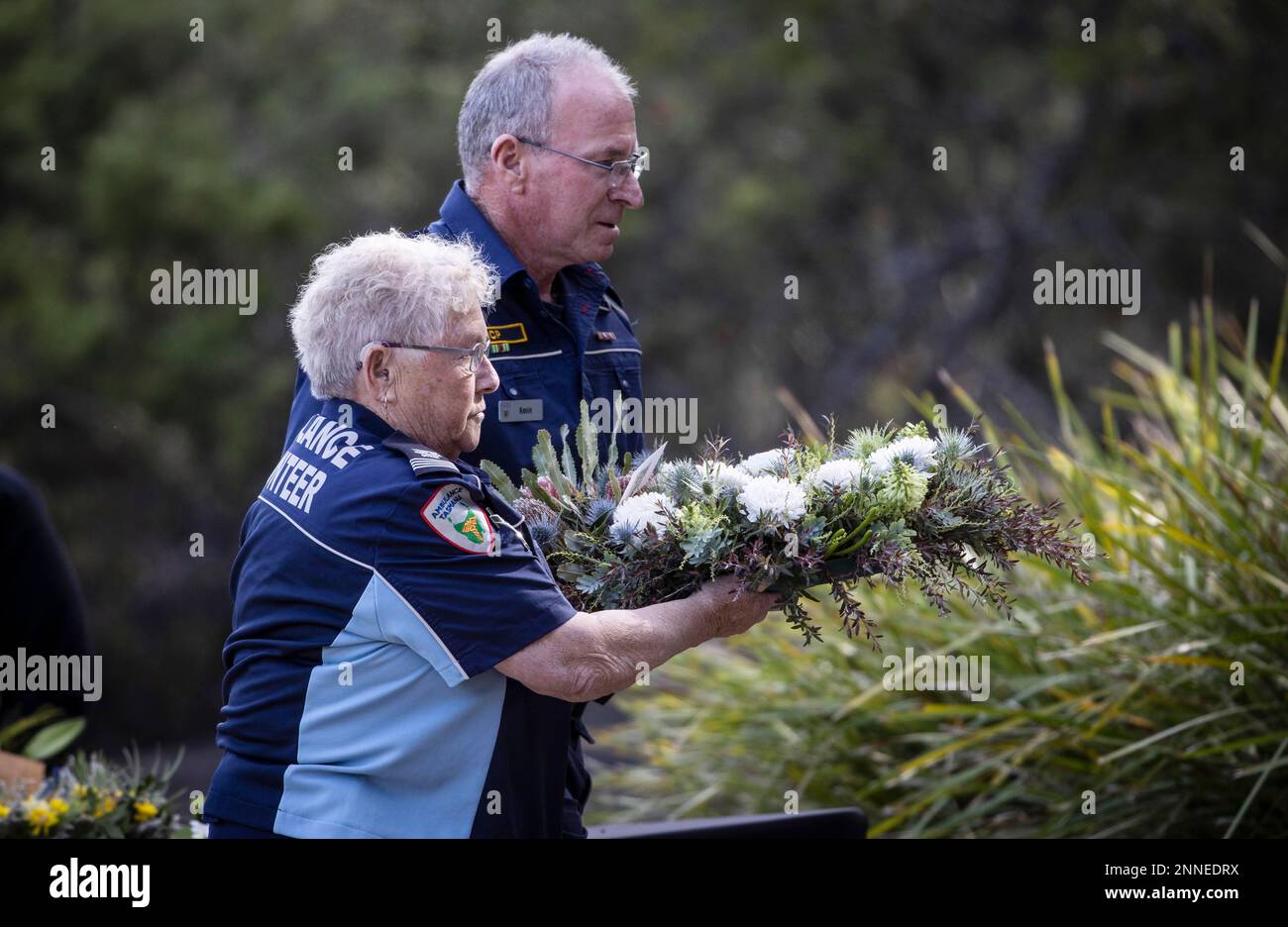 Ambulance Tasmania representatives Kevin Daly, right, and Kaye Fox lay ...