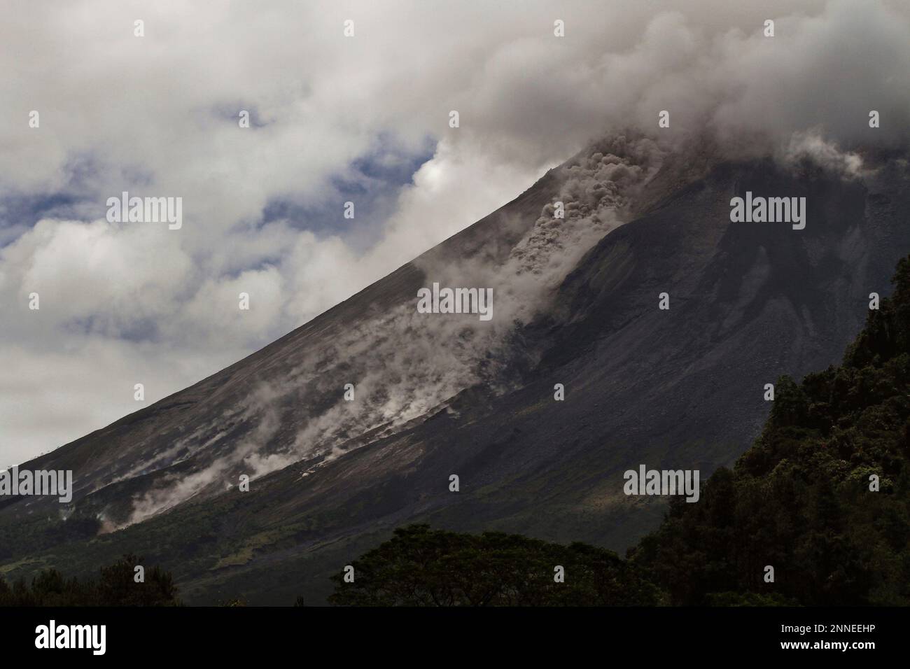 Ash and smoke spew from the crater of Mount Merapi, Indonesia's most ...