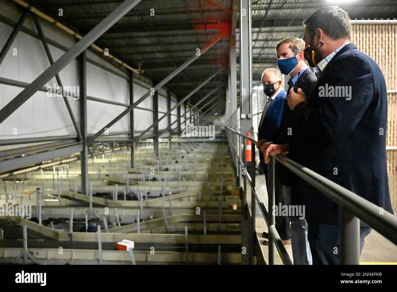 Kentucky Gov. Andy Beshear, center right, speaks with Jeff Wafford ...