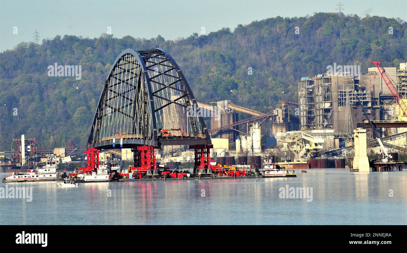Crews with Flatiron Construction move an 830-foot long tied arch span ...