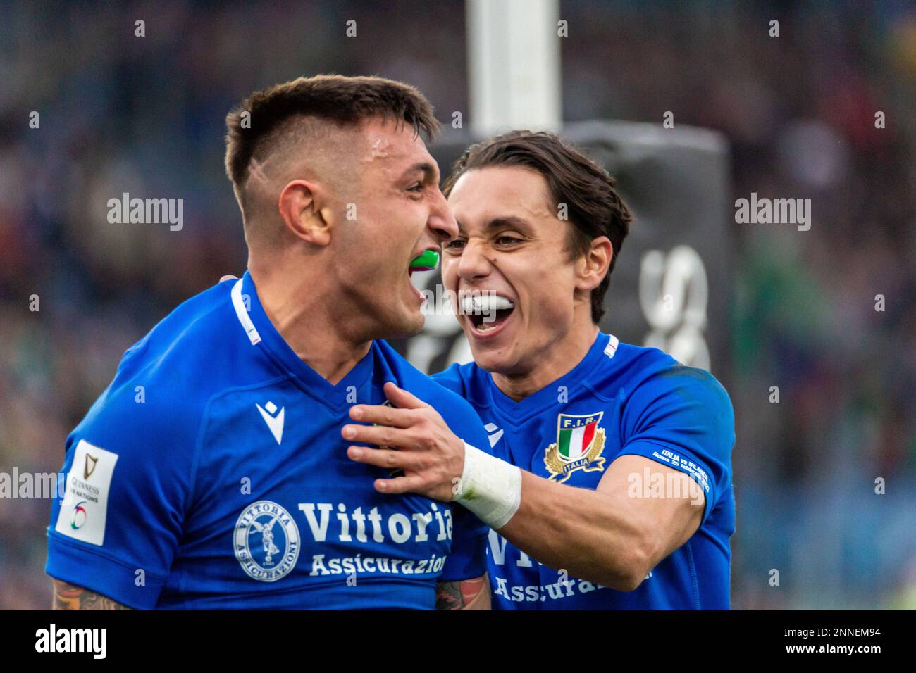 Rome, Italy. 25 Feb 2023. Italian full back Ange Capuozzo (right ...