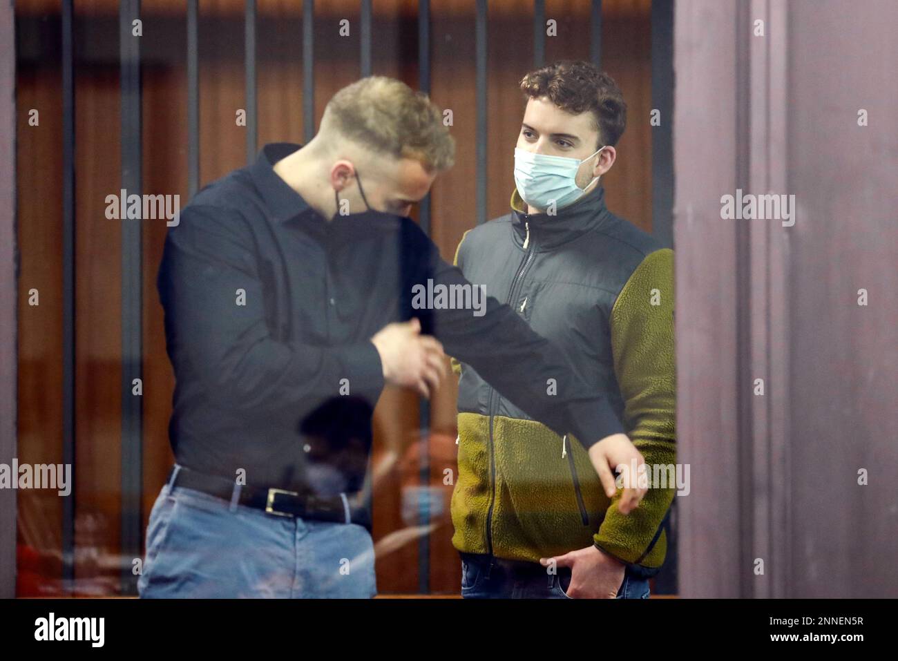 Finnegan Lee Elder, from the United States, left, and his co-defendant ...
