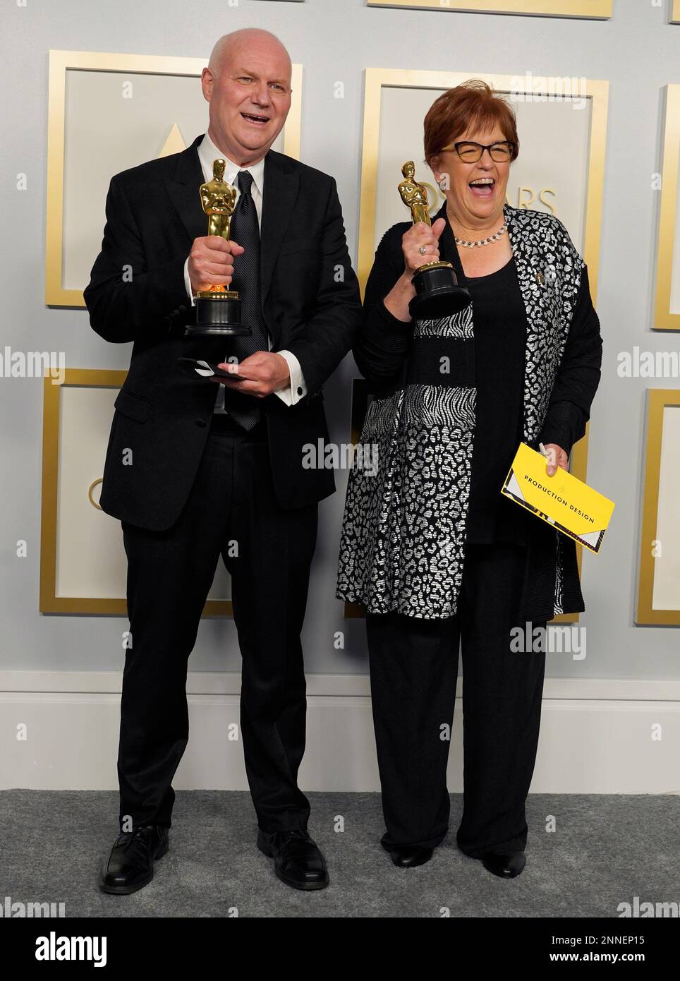 Donald Graham Burt, left, and Jan Pascale pose in the press room with ...