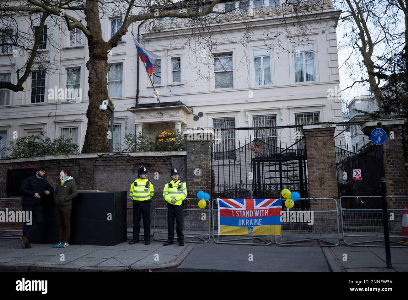 London, UK. 24th Feb, 2023. A combined flag of Union Jack and Ukrainian ...
