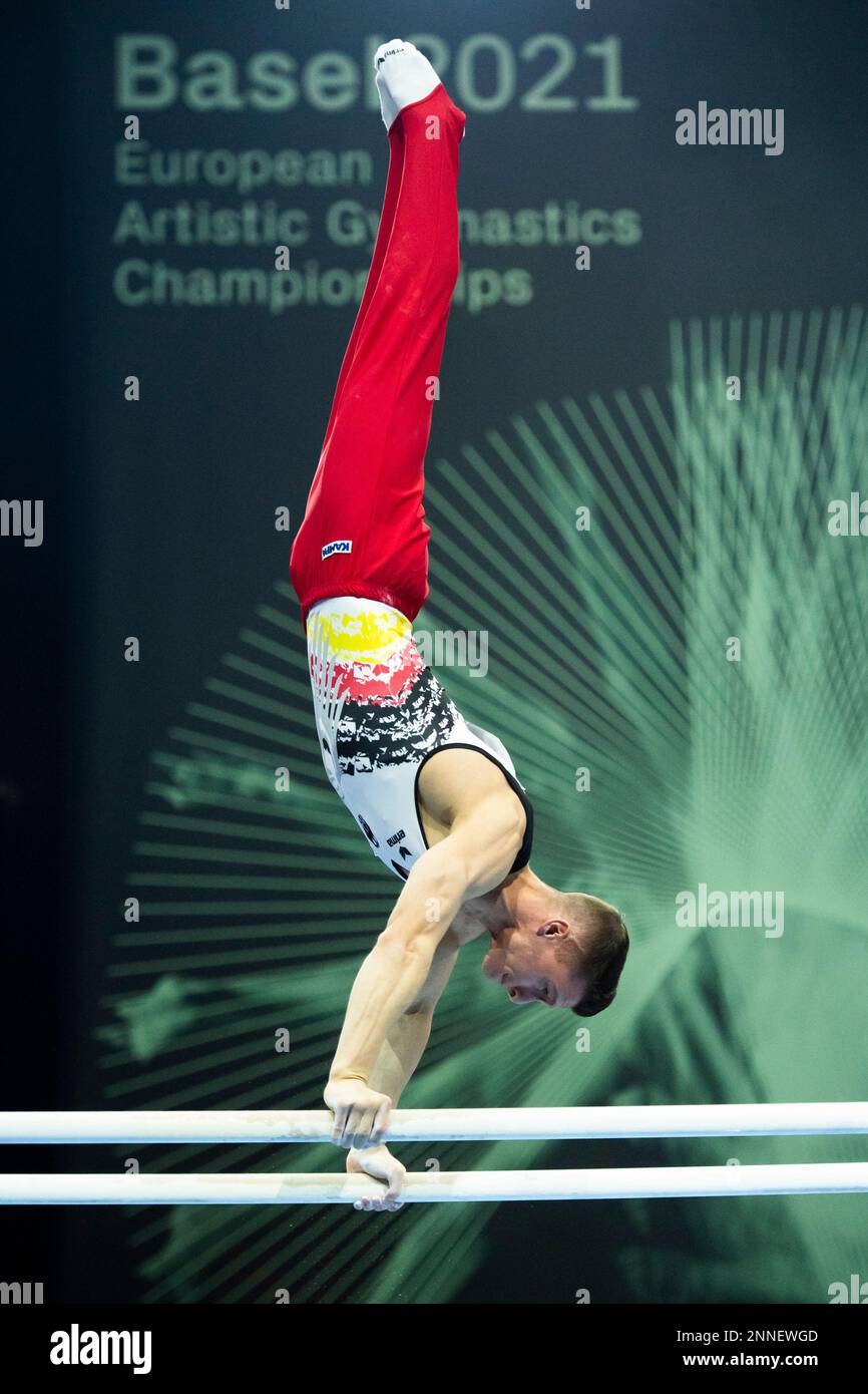 Germany's Lukas Dauser performs on the bars during the apparatus final ...