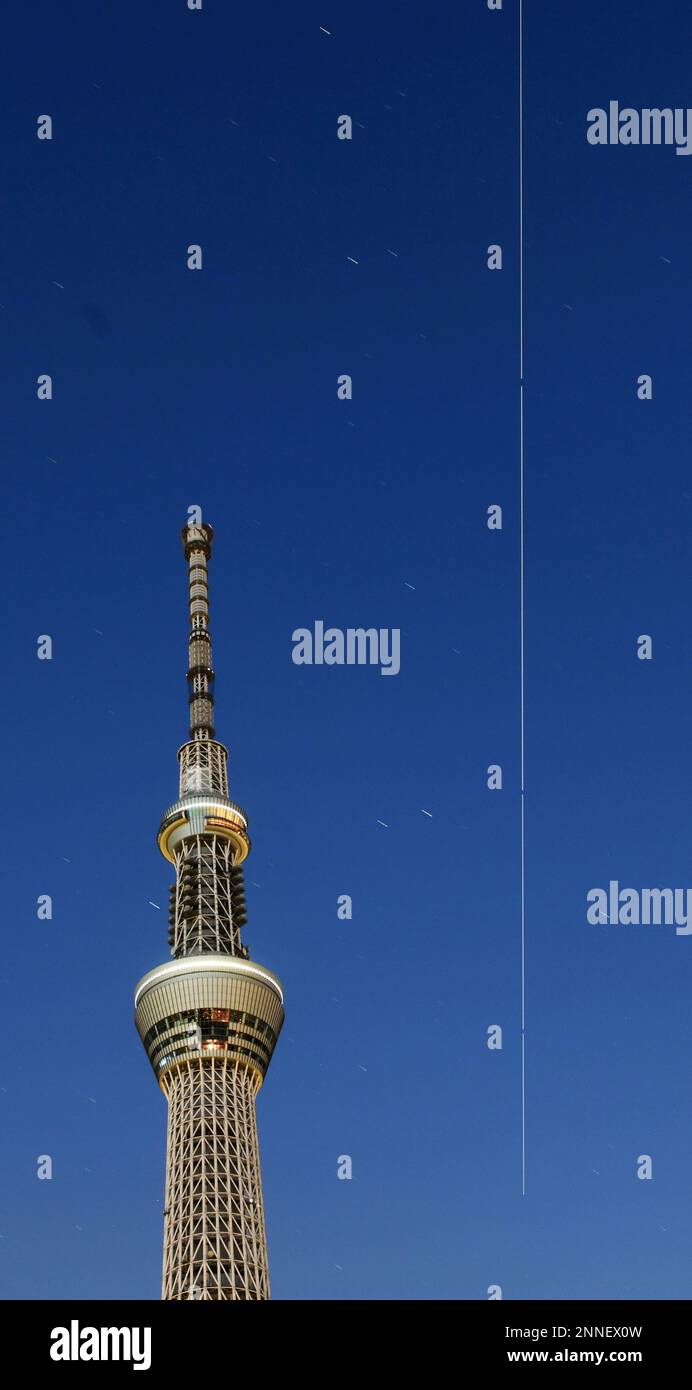 A composite photography shows the light trail of the International ...