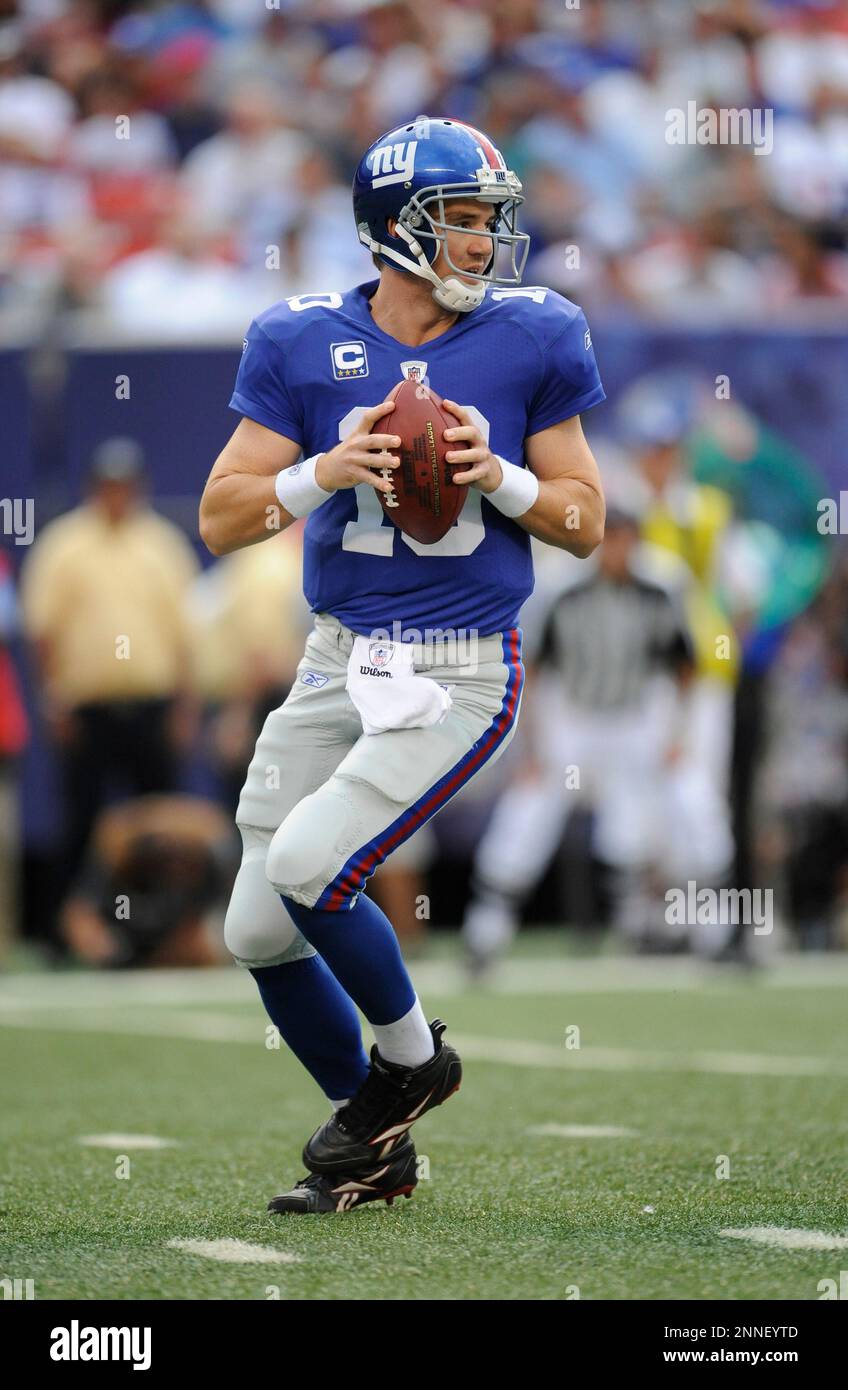 13 September 2009: New York Giants quarterback Eli Manning (10) drops ...