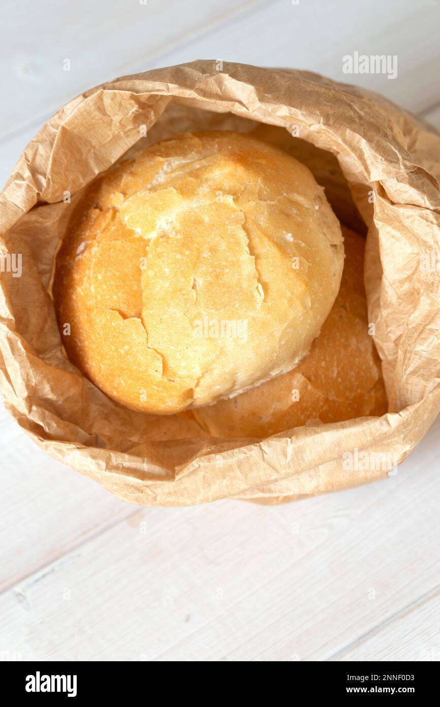 Bread roll buns in a brown paper bag. Eco friendly recycle disposable ...