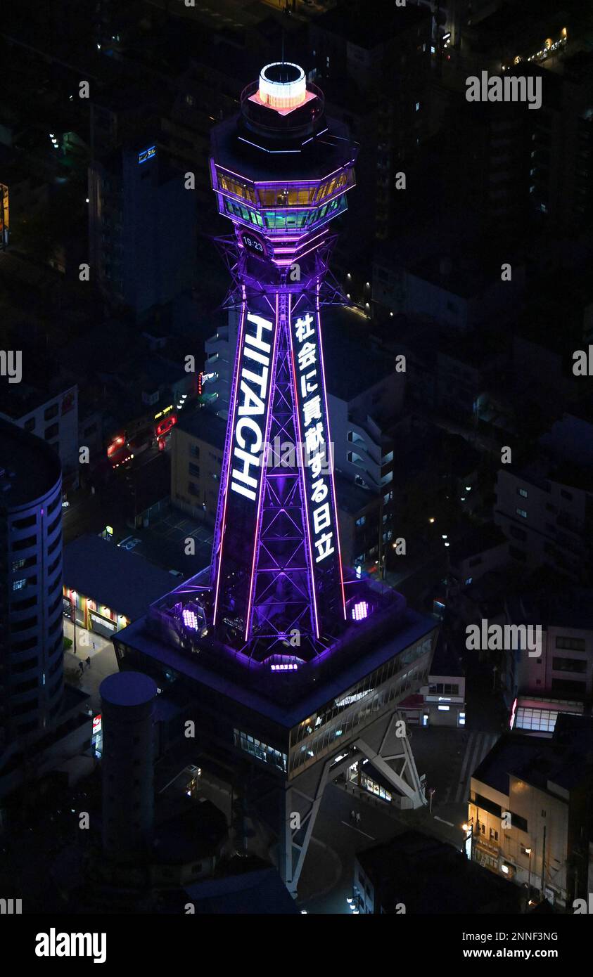 A night aerial photo shows Tsutenkaku Tower, a landmark of Osaka, lit ...