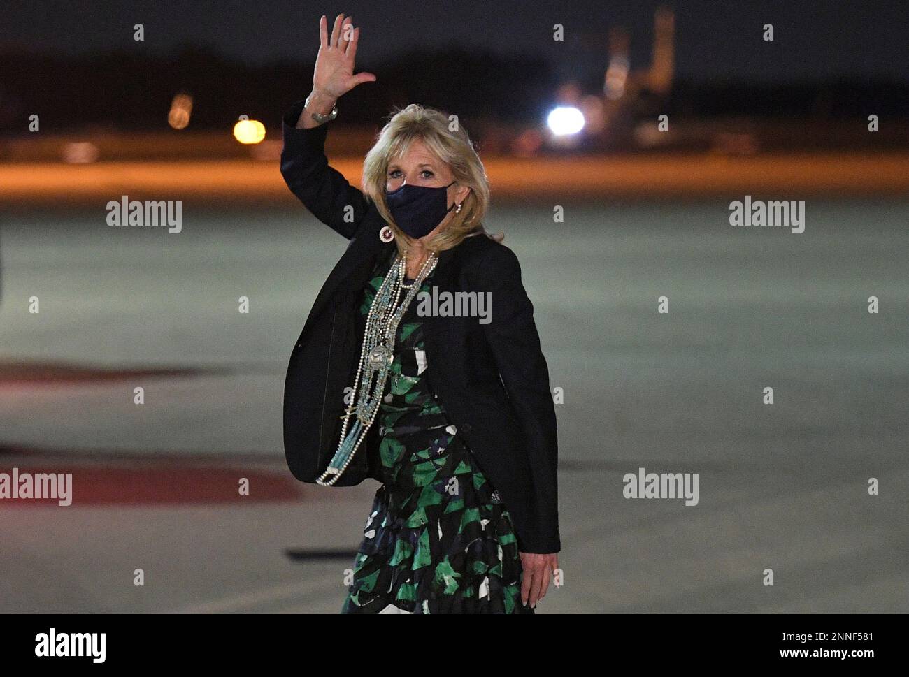 First lady Jill Biden waves as she deplanes upon arrival at Andrews Air ...