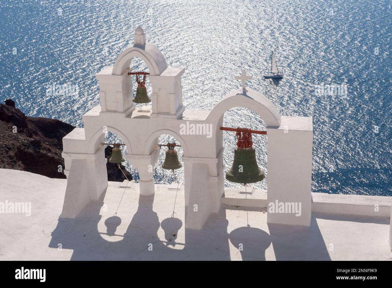 Europe, Greece, Santorini, Oia. View of the church bells from Oia ...