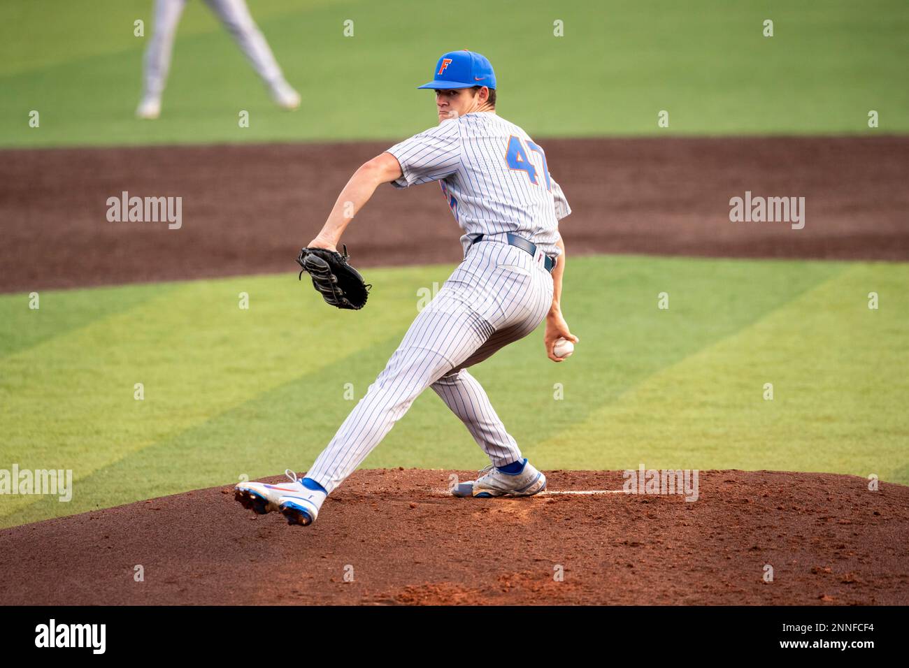 Florida Gators starting pitcher Tommy Mace (47) delivers a pitch to the ...