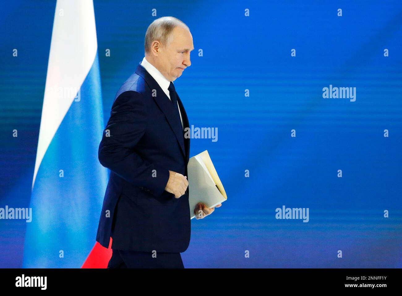 Russian President Vladimir Putin enters the hall for his annual state ...