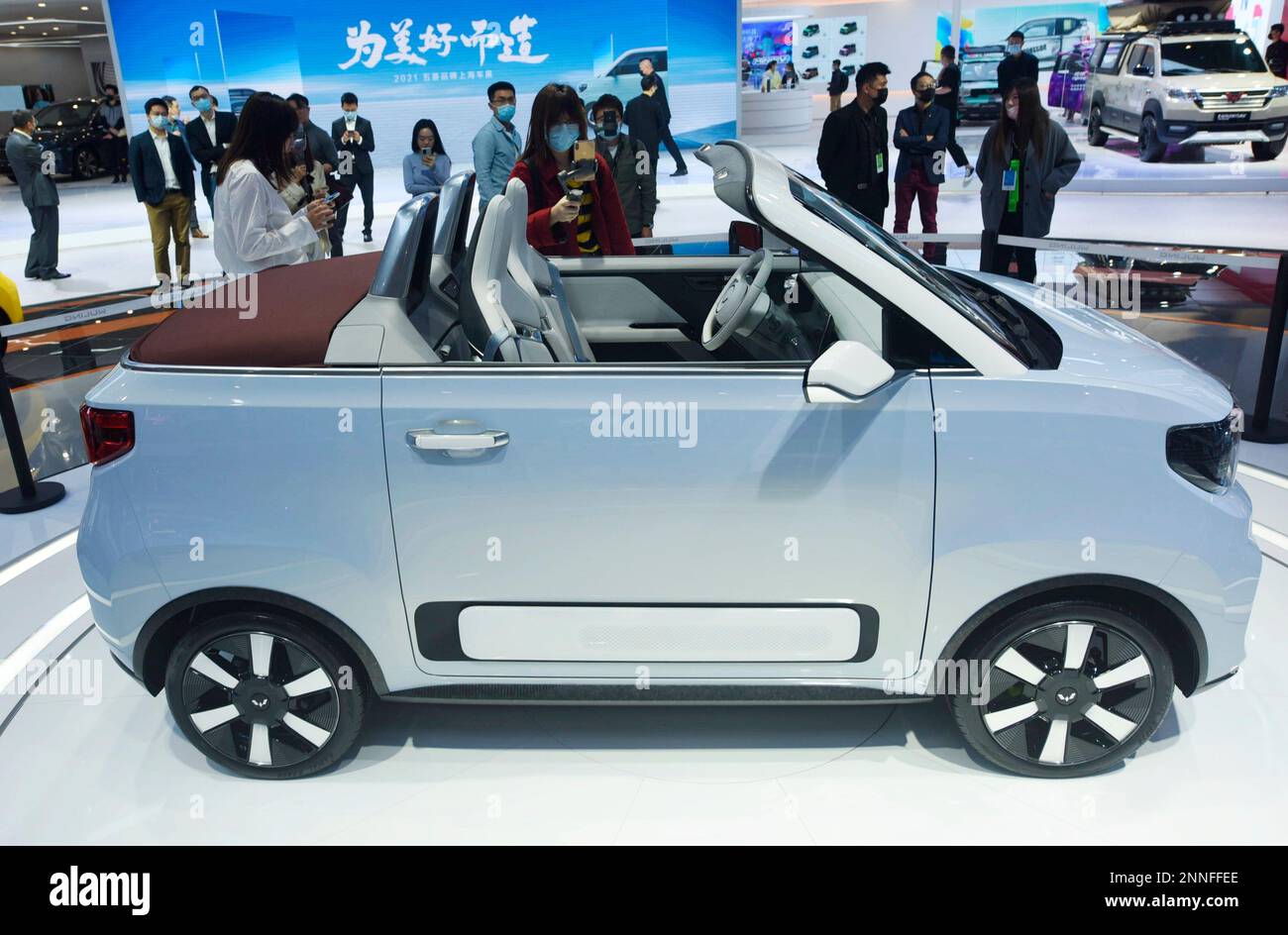 A view of a Wuling Hongguang Mini EV convertible electric two-seat car ...