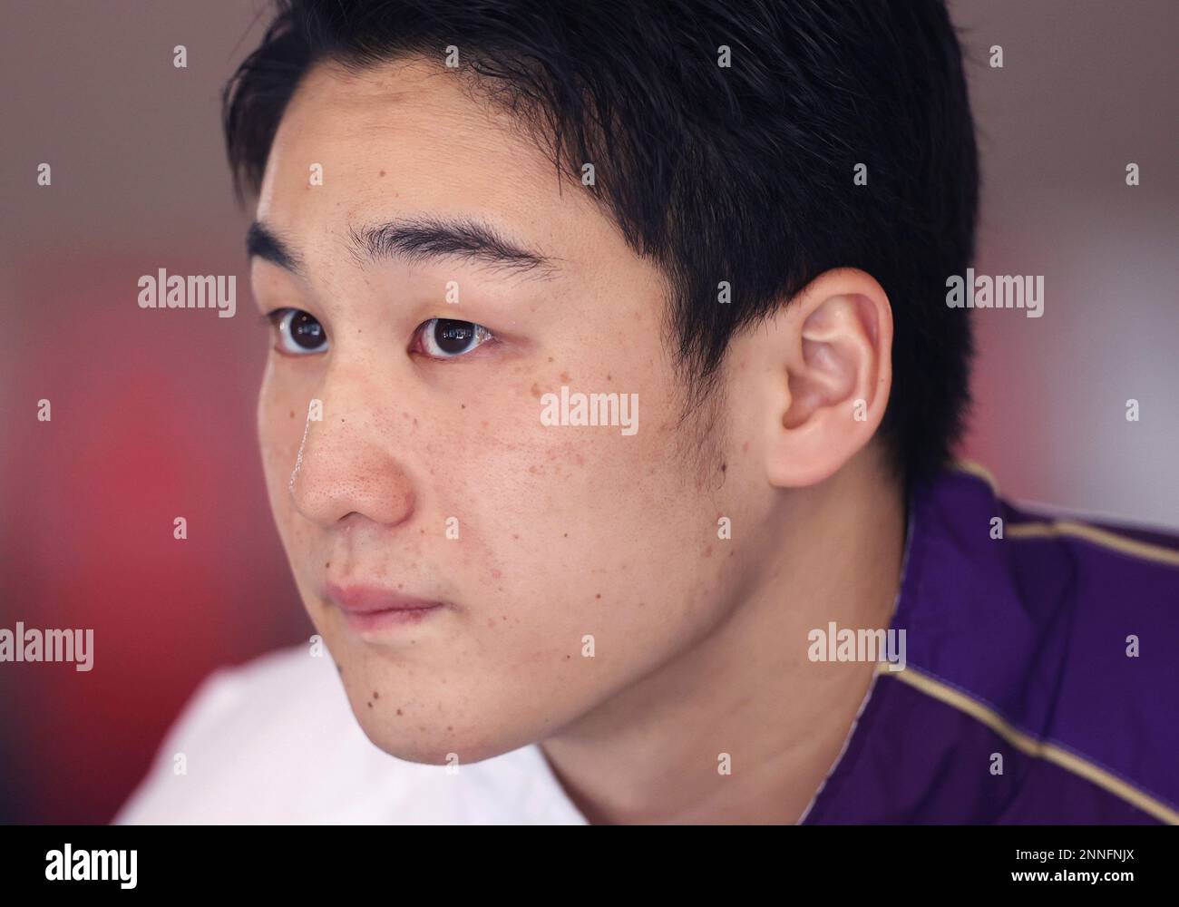 Shoma Sato, a Japanese competitive swimmer, speaks to media before his ...