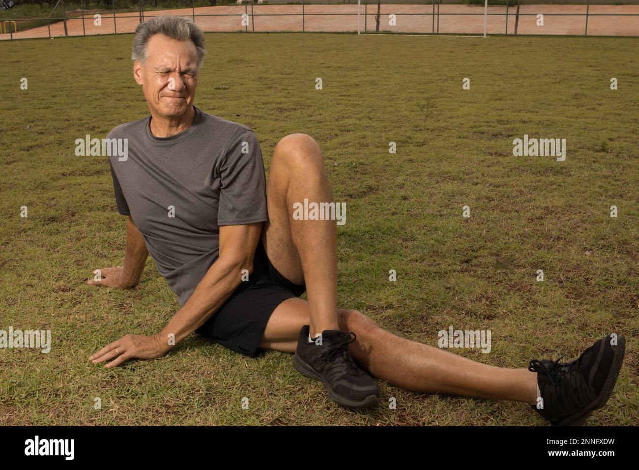 Male stretching legs muscles hi-res stock photography and images - Alamy