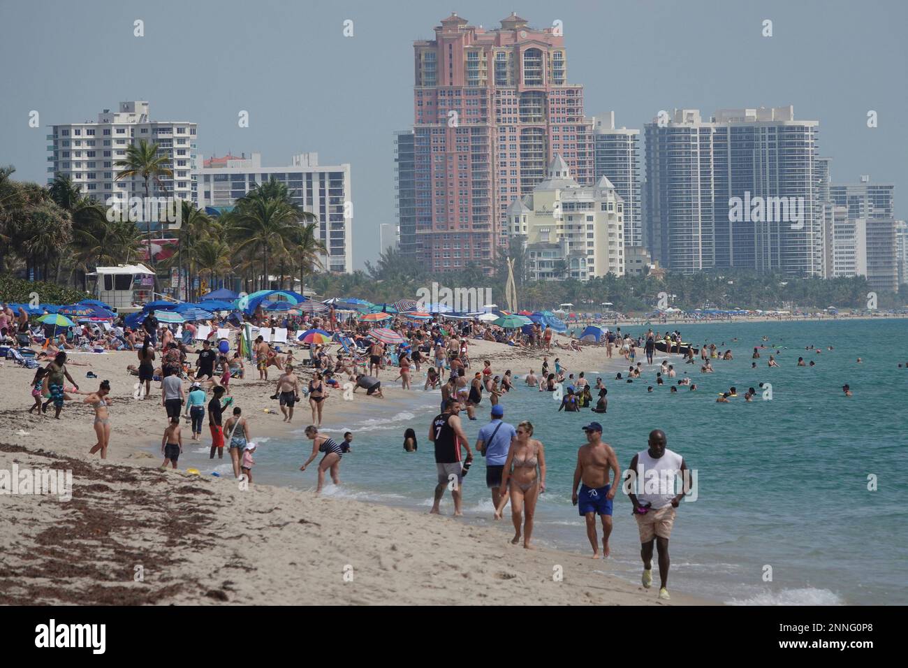 Warm temperatures and cool breezes made for crowded beaches in South ...