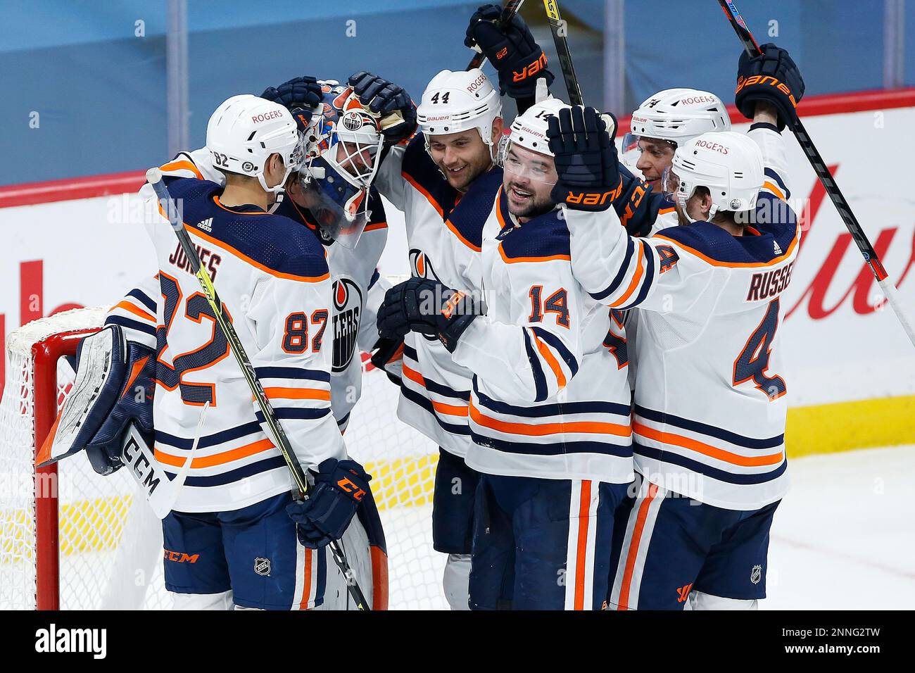 Edmonton Oilers goaltender Mike Smith, second from left, and teammates ...