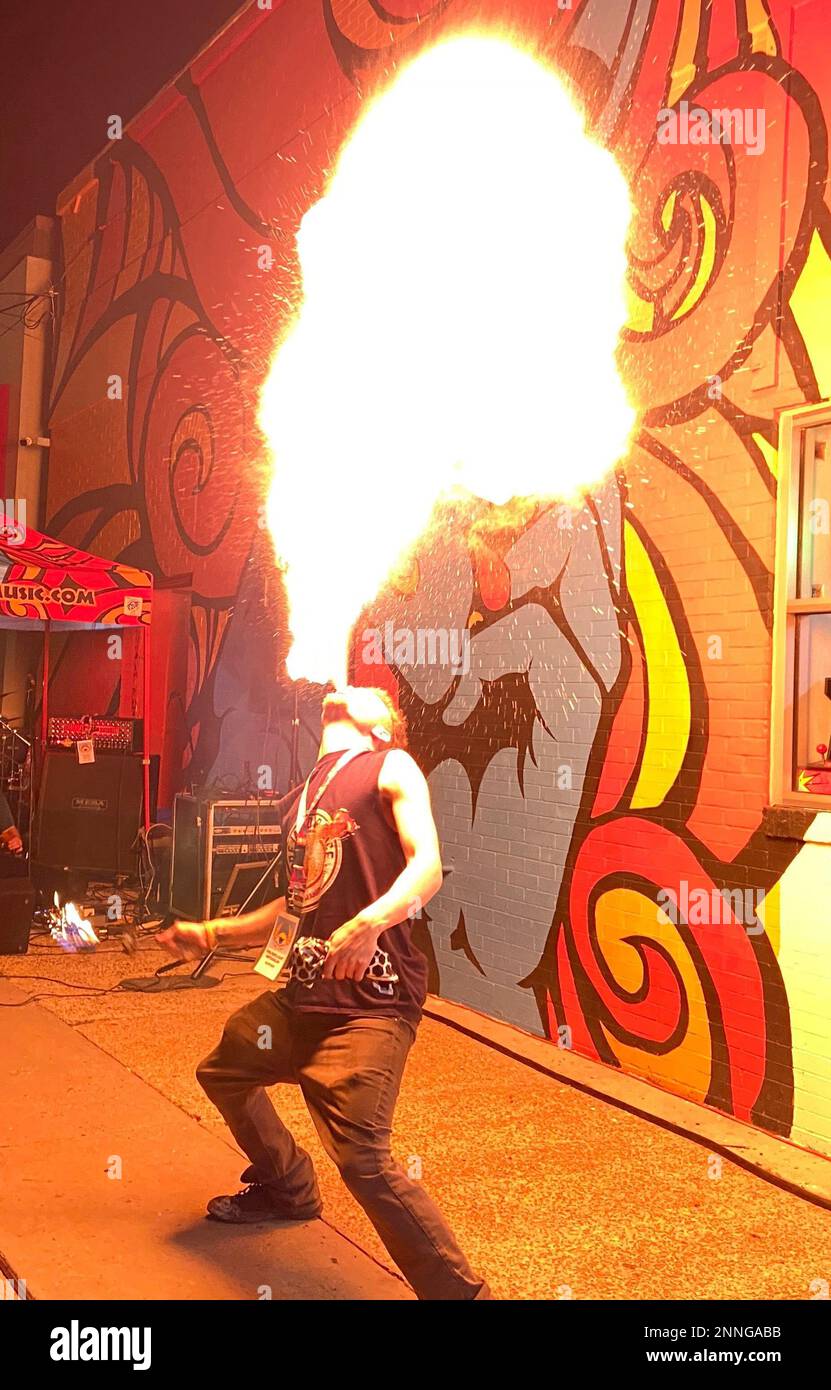 Allen Bond, with Gyspy.Soul.Circus, displays his fire-eating abilities ...