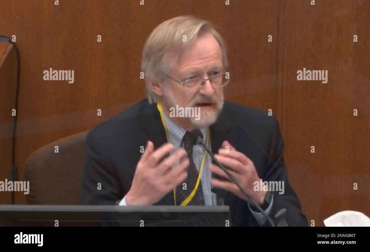 In this image from video, Dr. Martin Tobin testifies as Hennepin County ...