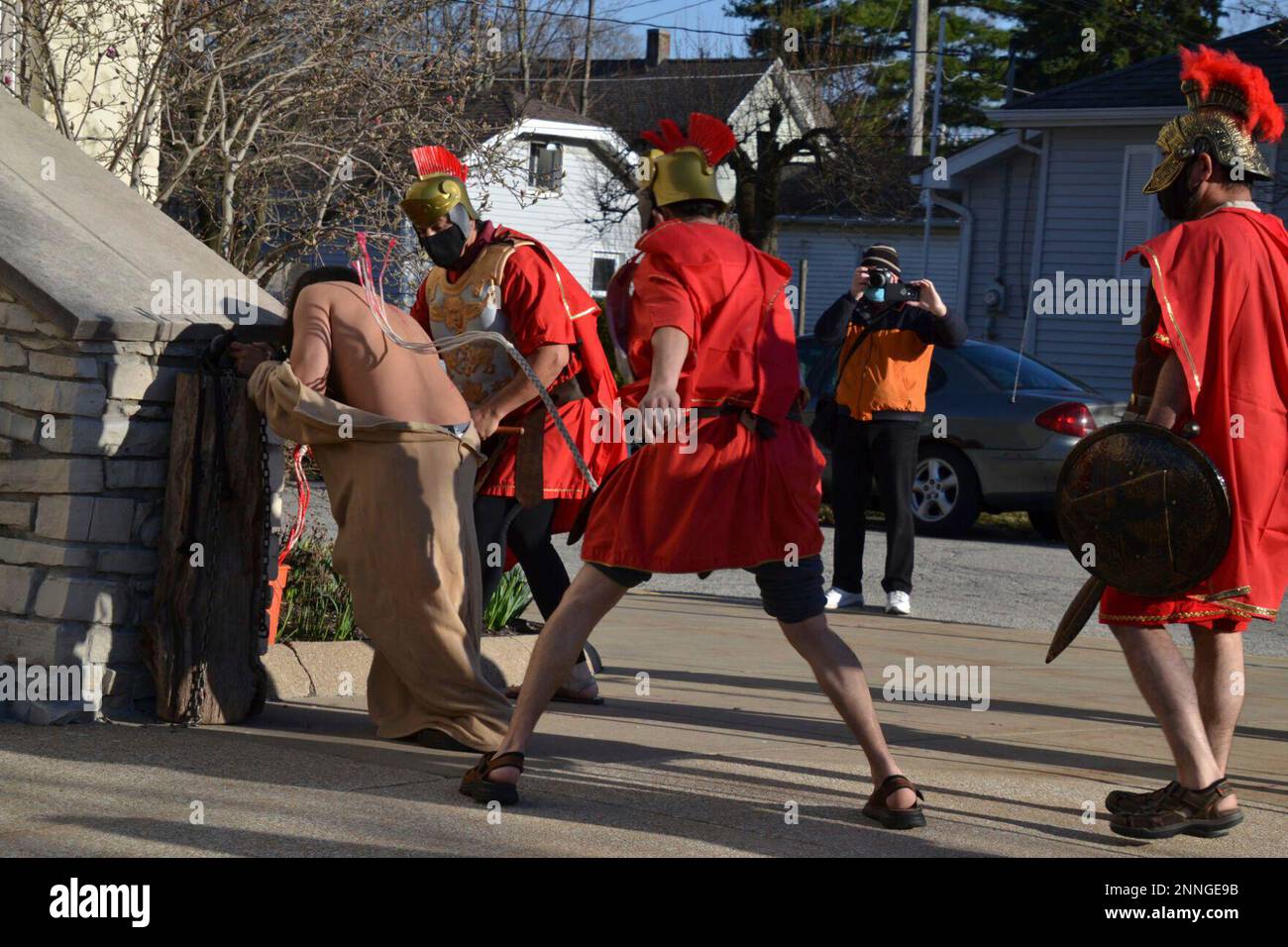 Re-enactors portray Jesus being beaten by Roman soldiers during the ...
