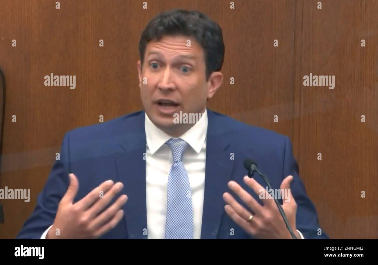 In this image from video, Dr. Jonathan Rich, a cardiologist, testifies ...