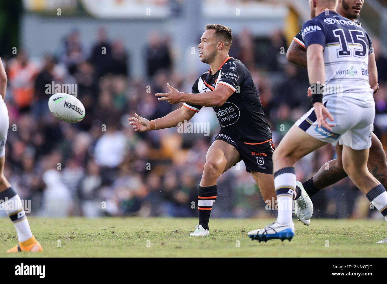 SYDNEY, AUSTRALIA - APRIL 11: Luke Brooks of the Tigers passes during ...