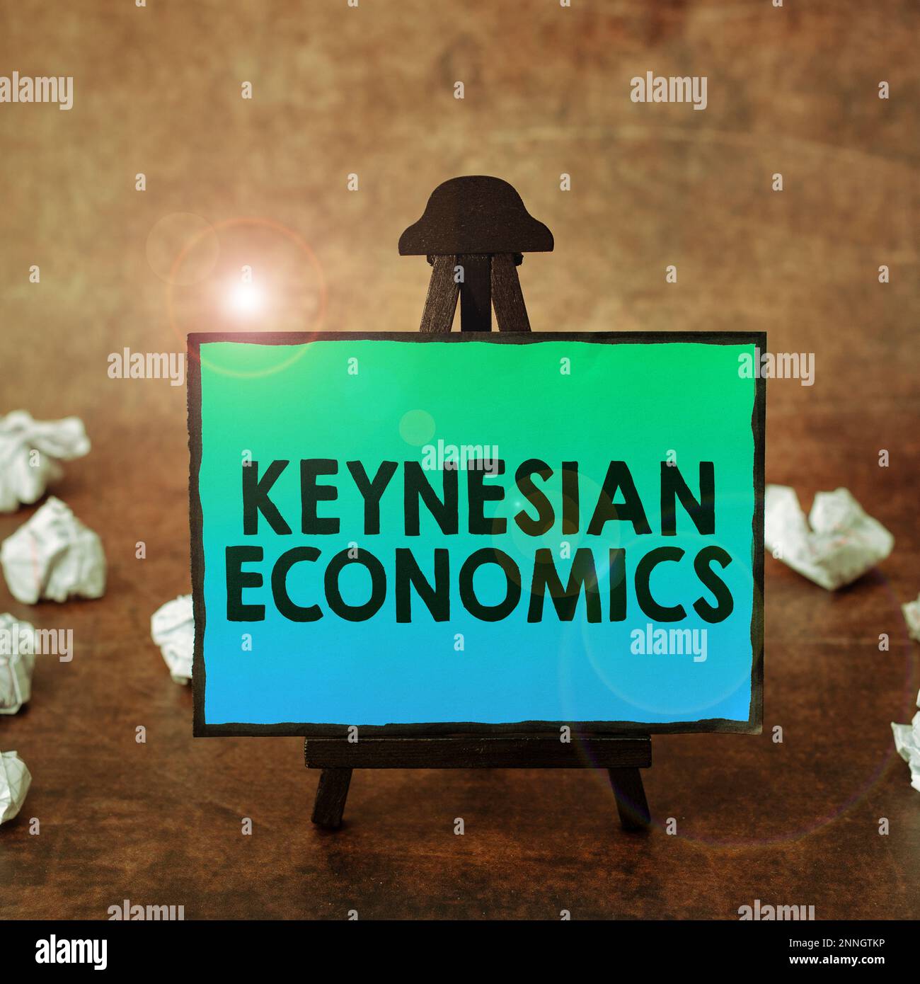 Hand writing sign Keynesian Economics. Word for monetary and fiscal ...