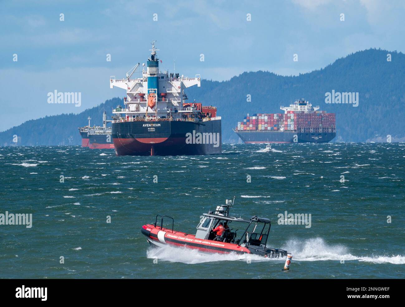 A Canadian Coast Guard boat crashes over the waves as it leaves False ...