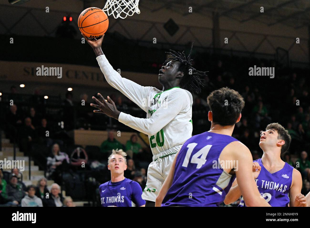 North Dakota Fighting Hawks forward B.J. Omot (20) shoots the ball ...