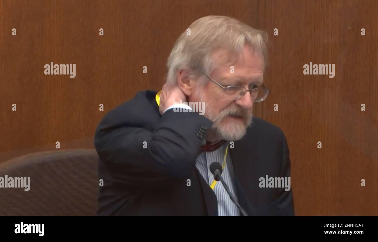 In this image from video, Dr. Martin Tobin testifies as Hennepin County ...