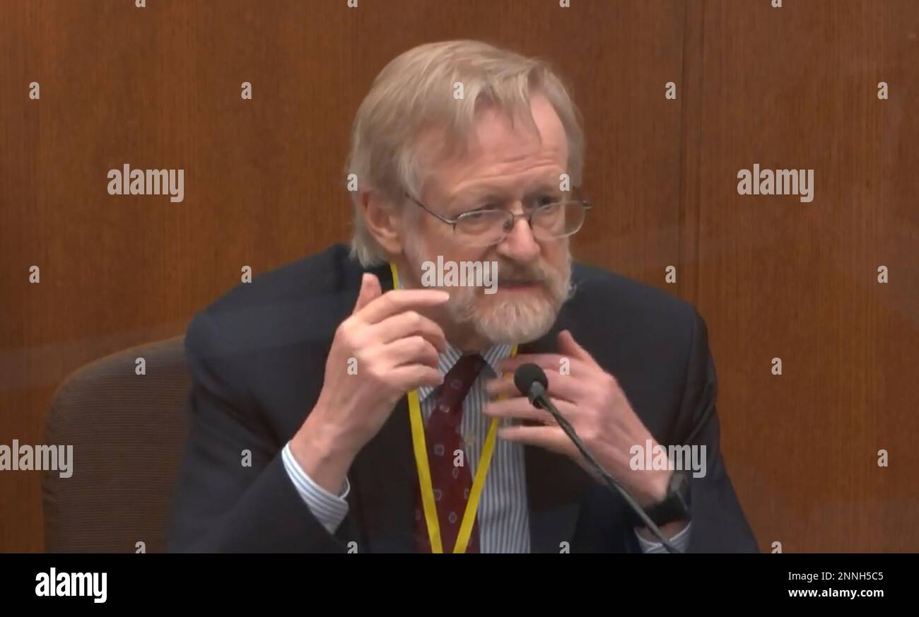 In this image from video, Dr. Martin Tobin testifies as Hennepin County ...