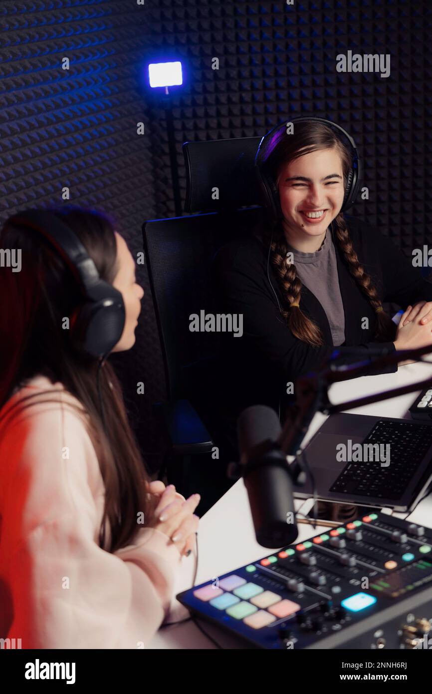 Women speaking during radio program in studio Stock Photo - Alamy