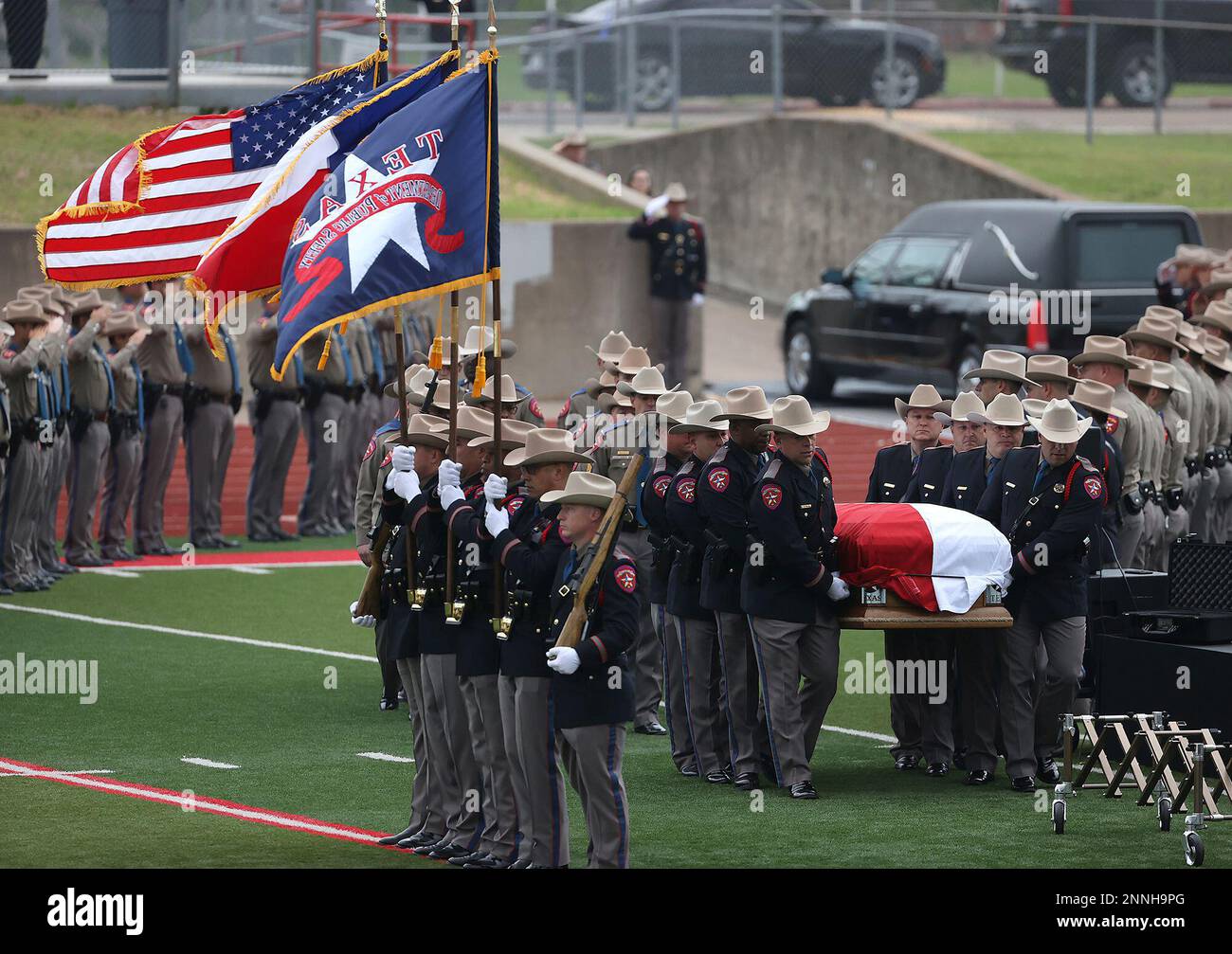 Texas Department of Safety trooper honor guards carry the casket of DPS ...