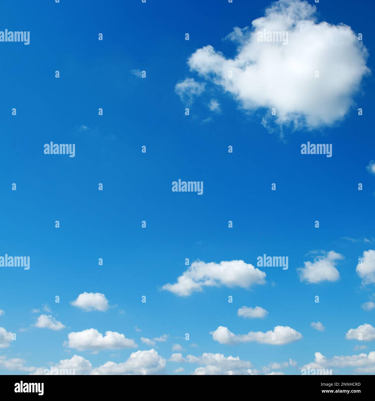Bright blue sky with white clouds Stock Photo - Alamy