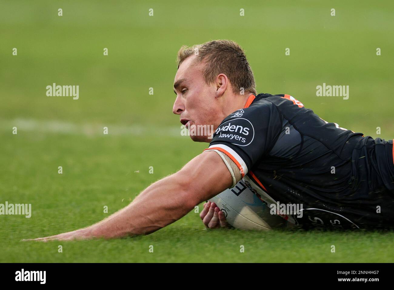 SYDNEY, AUSTRALIA - APRIL 05: Jacob Liddle of the Tigers scores a try ...