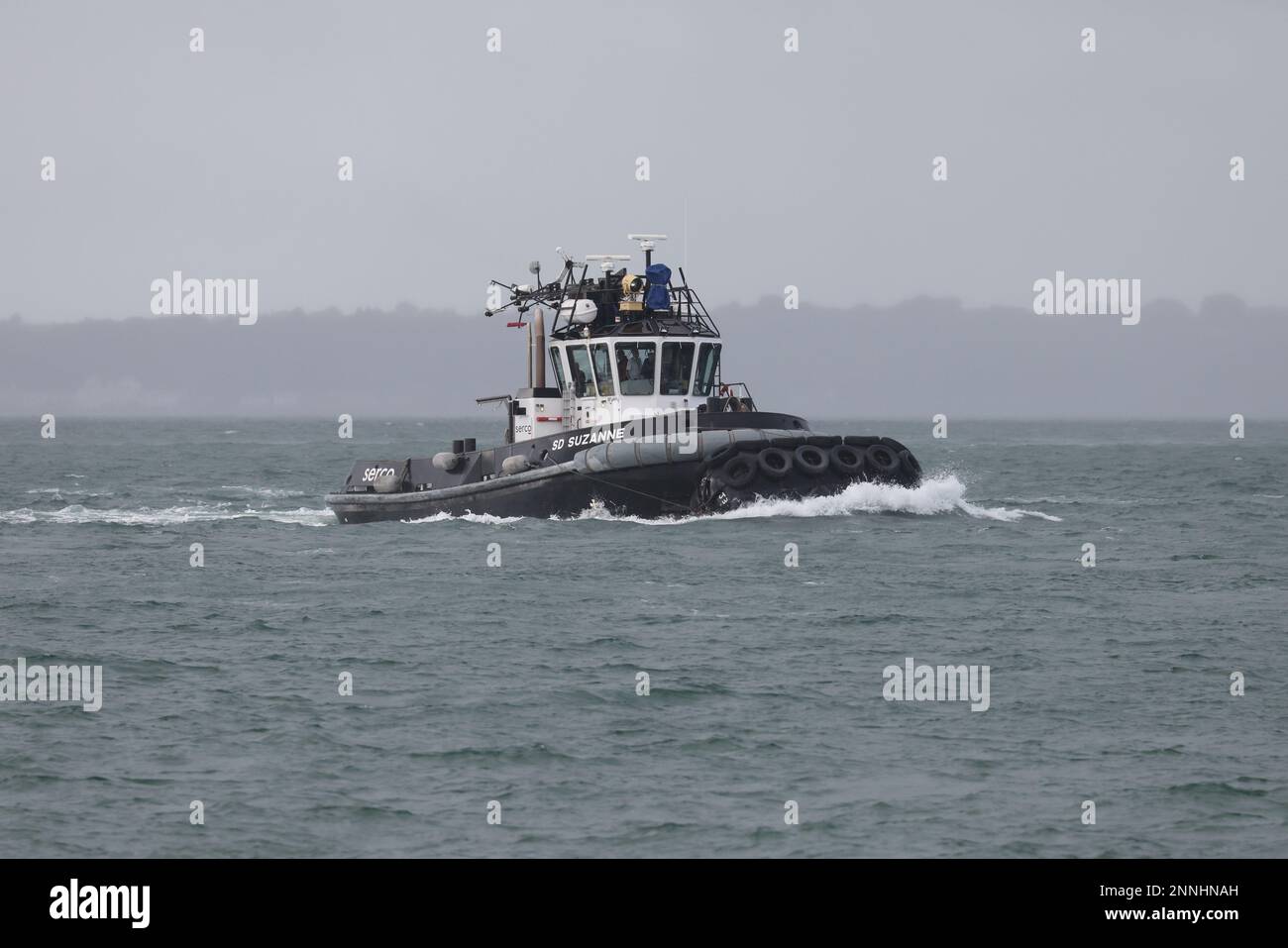 The Serco Marine tug SD SUZANNE, with its mast lowered, returns to the ...