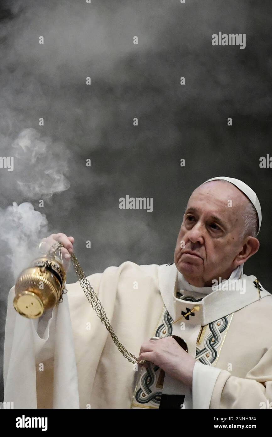 Pope Francis swings a thurible of incense as he prepares to celebrate ...
