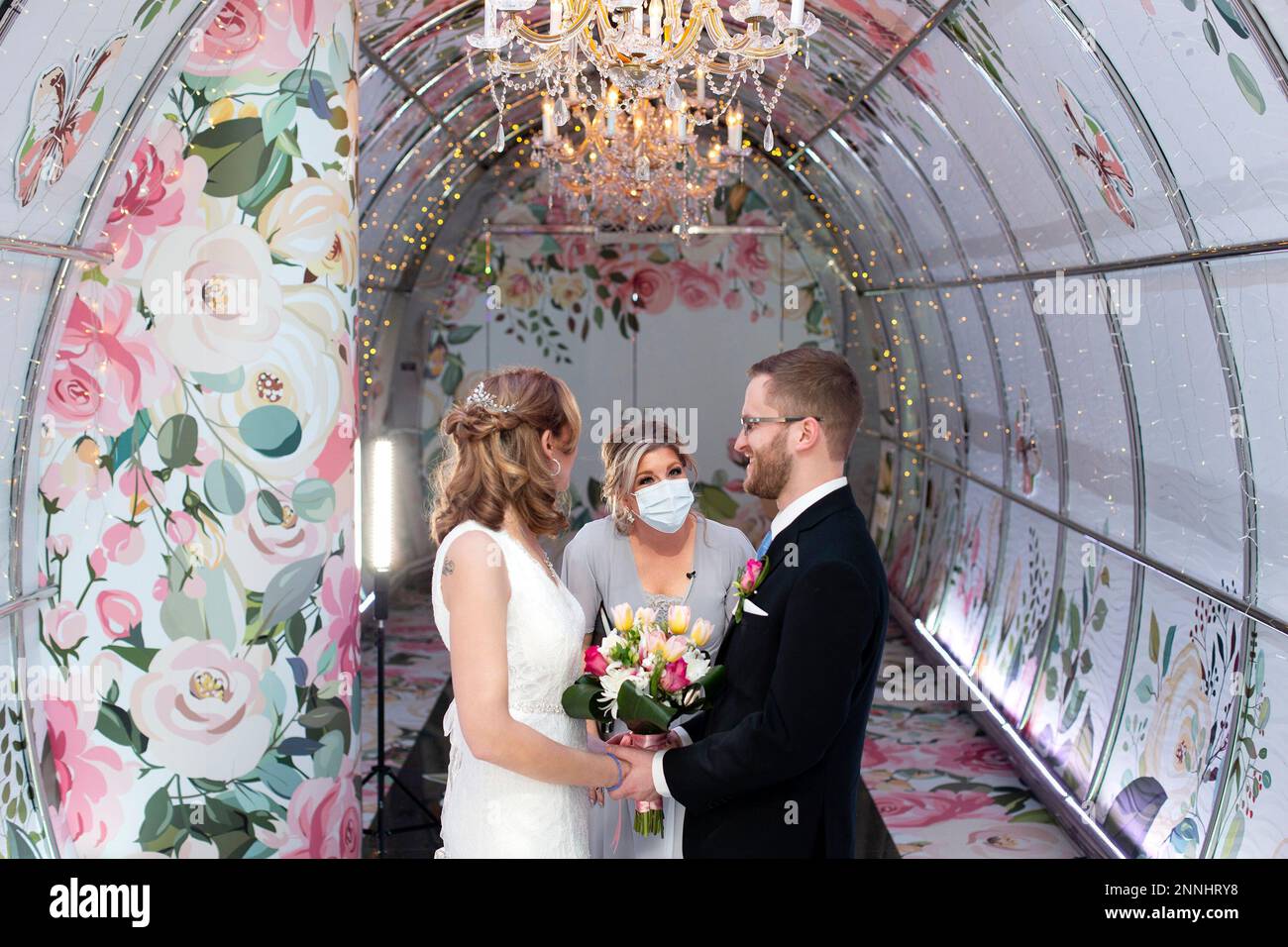Angie Kelly officiates the wedding of Morgan Sheets and Kyle Kingdon at ...