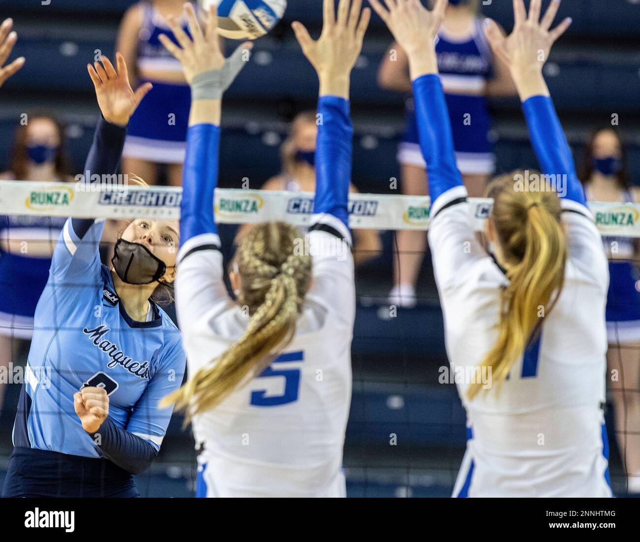 Marquette's Hope Werch hits the ball at Creighton's Kiara Reinhardt ...