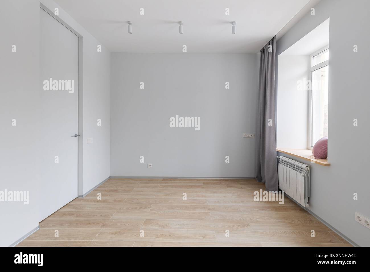Empty gray room ready for people to move in Stock Photo - Alamy