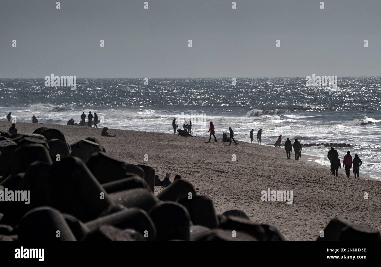People enjoy the sunny weather at the beach on island Sylt in ...