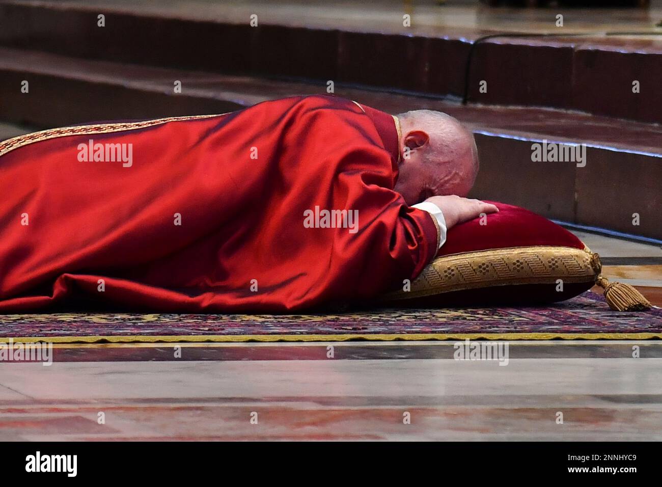 Pope Francis lies down in prayer prior to celebrate Mass for the ...