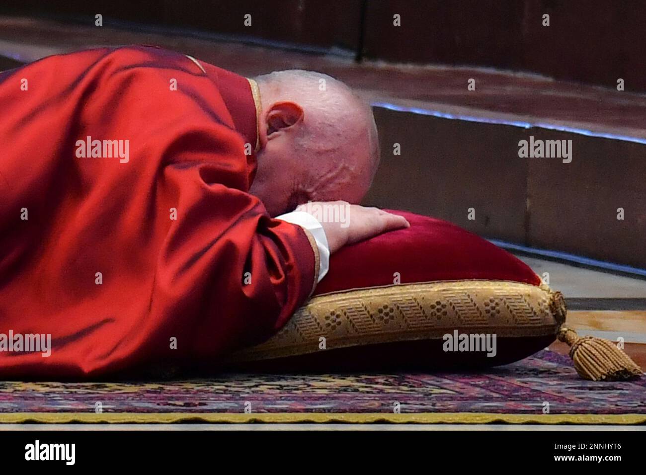 Pope Francis lies down in prayer prior to celebrate Mass for the ...