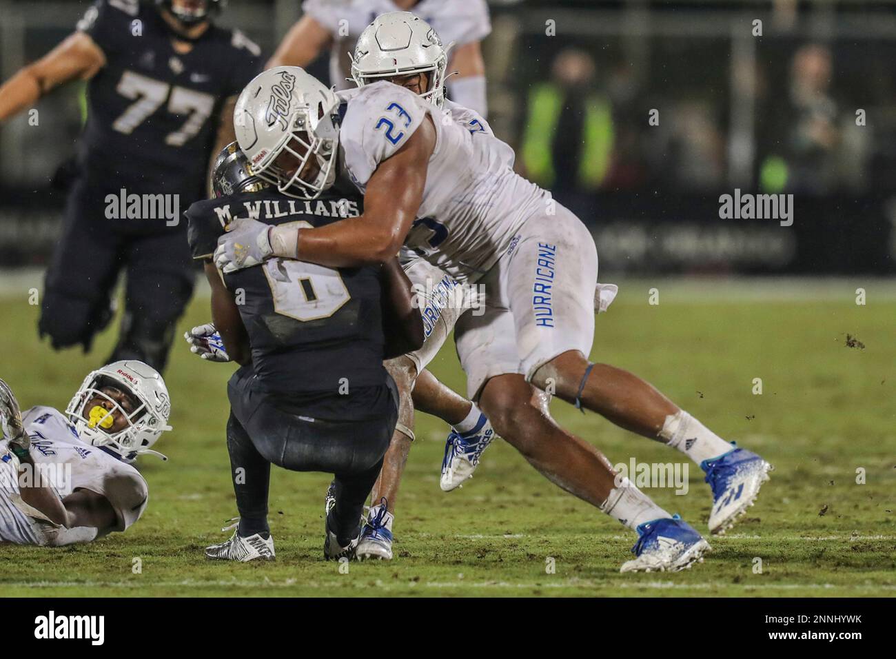 Zeaven Collins (23) of the Tulsa Golden Hurricane tackles Wide receiver ...
