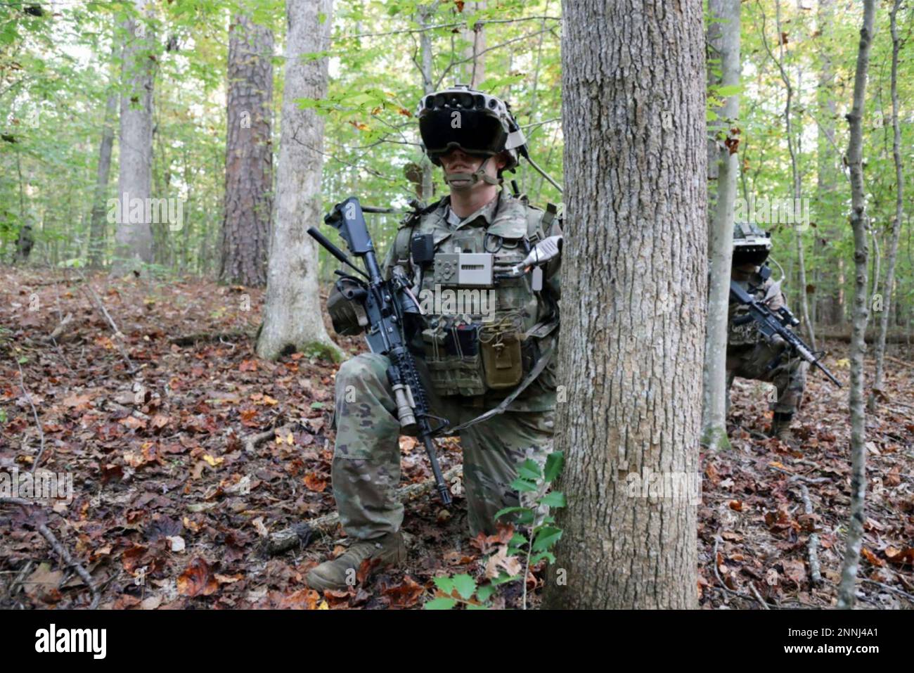 In this Oct. 23, 2020, photo provided by the U.S. Army, a soldier dons ...